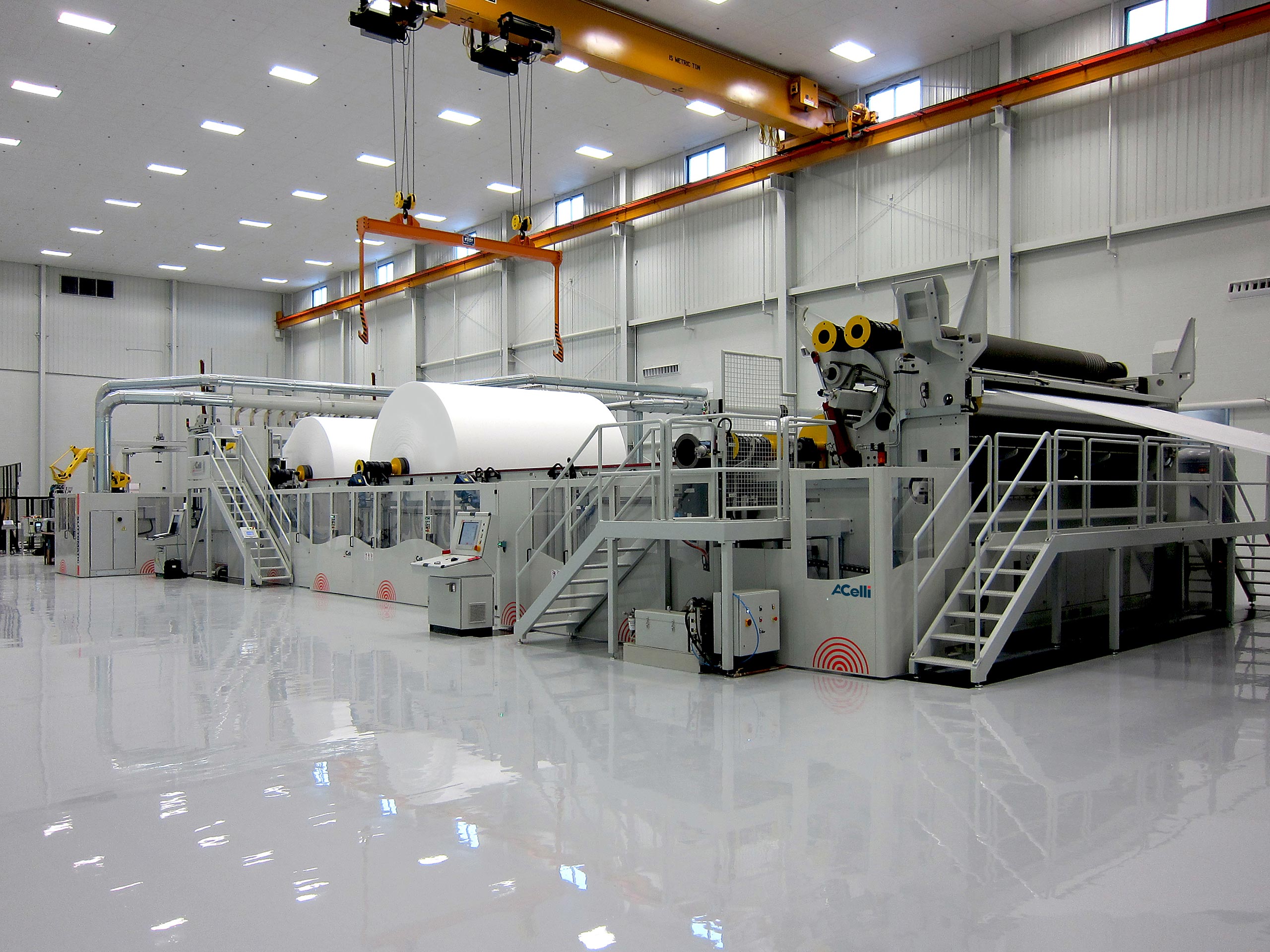 Combi | Integrated solution for nonwovens master roll transfer